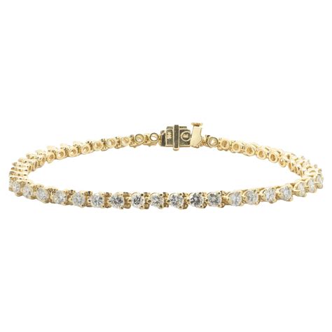 14 Karat Yellow Gold Aquamarine Tennis Bracelet Set With 26
