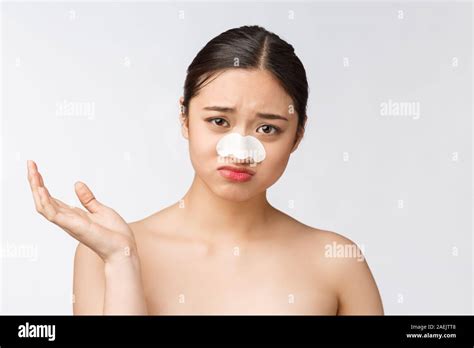 Cosmetology Portrait Of Beautiful Female Asian Model With Mask On Nose