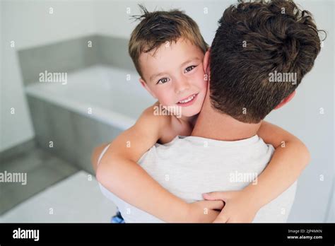 My Dad Always Gives Me Tlc An Unrecognizable Father Hugging His
