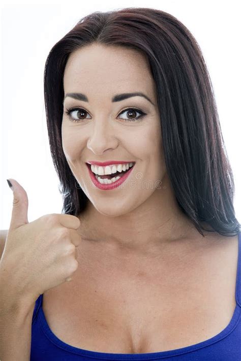 Close Up Portrait Of An Attractive Young Woman Smiling Giving Th Stock