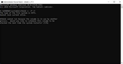 chkdsk cannot run because the volume is in use by another process