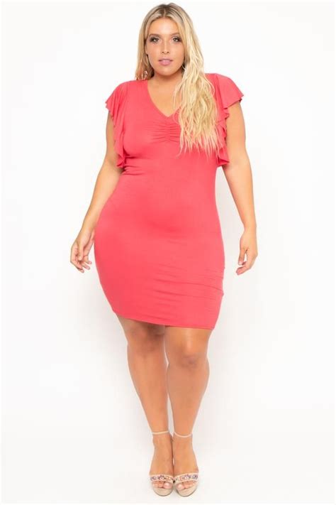 This Plus Size Extra Stretch Knit Dress Features A Vee Neckline With