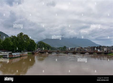 A View Of River Jhelum Flowing Over The Flood Alert Mark Following