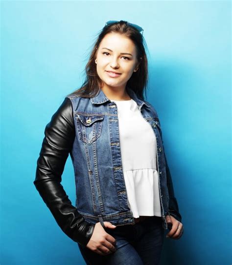 Premium Photo Beautiful Girl Wearing Casual Clothes Posing On Blue