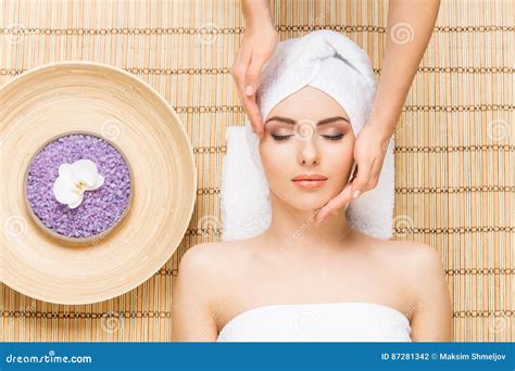 Beautiful Young And Healthy Woman On Bamboo Mat In Spa Salon Ha Stock