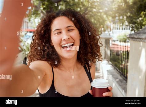 Mixed Race Young Woman Taking A Selfie While Out Exploring The City