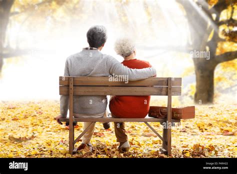 Elderly Couple On Bench