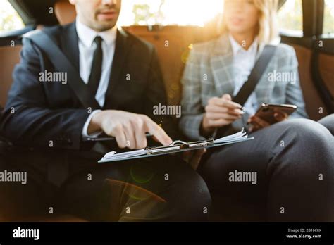Image Of Young Caucasian Businesslike Man And Woman In Formal Wear