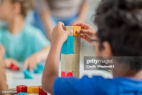 Image result for Children Building Blocks Using a Ladder