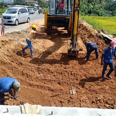 Image result for Indian Man Using Soil Compaction Machine