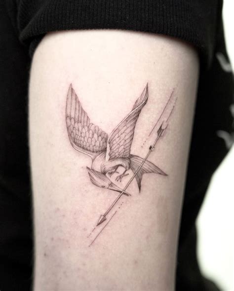 22 Incredible Hunger Games Tattoo Ideas Fit For Die-Hard Fans