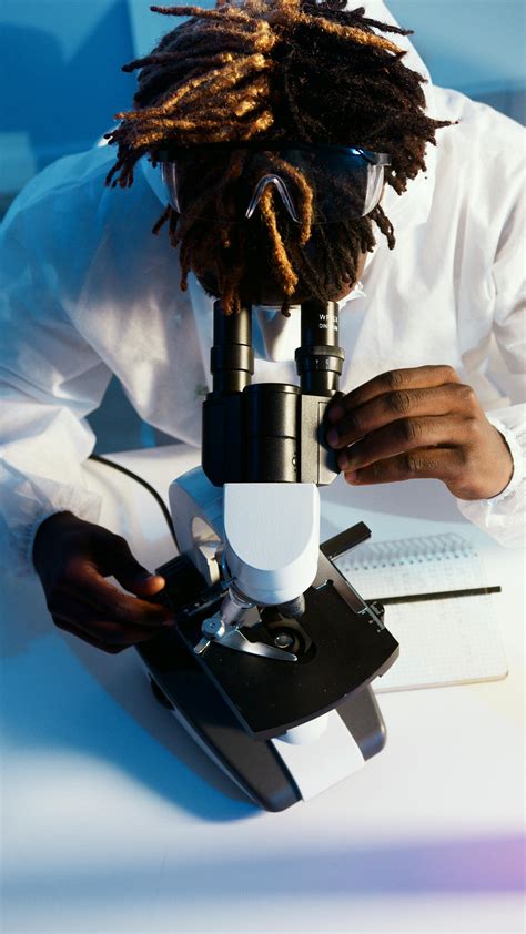 Image result for Looking through Microscope