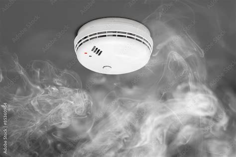 smoke detector of fire alarm in action Stock Photo | Adobe Stock