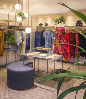 Image result for Small Cheap Clothes Shop Design