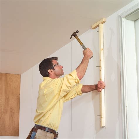 How To Build Garage Cabinets with Sliding Doors | Family Handyman