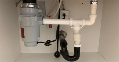 Image result for Garbage Disposal Leaking From Electrical Connection
