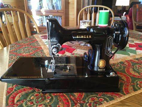 Image result for Singer Featherweight Sewing Machine