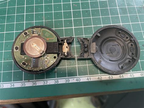 Image result for Changing Battery On a Mini Key