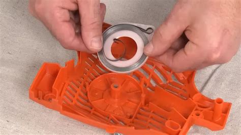 Image result for Chainsaw Pull Start Spring Repair