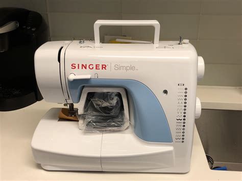 Image result for Singer Simple Sewing Machine 3118