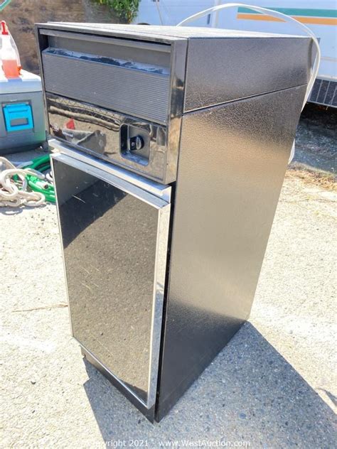 Image result for GE Compact All Trash Compactor How to Load Bag