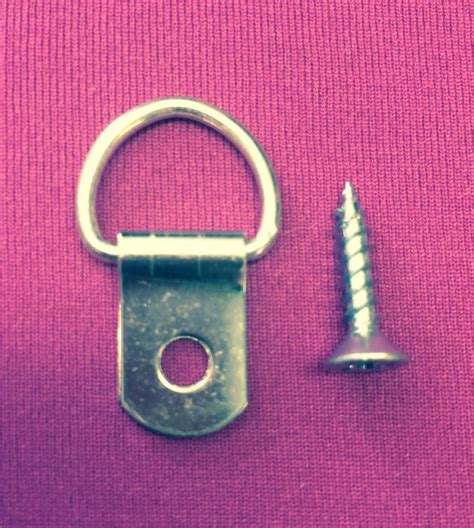 Image result for Fixing D Clips to Picture Frame