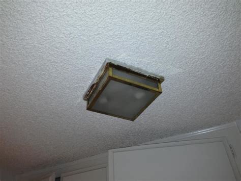 Image result for How Do You Remove a Ceiling Spotlight