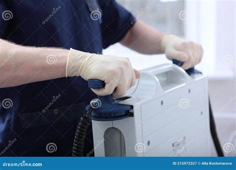 The Resuscitator Checks The Defibrillation Equipment. Intensive Care In ...