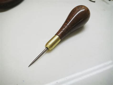 Image result for Using a Stitching Awl