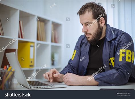 Image result for Federal Agent Typing On a Computer