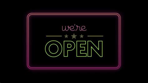 A glowing neon OPEN sign animation with smooth flickering effects ...