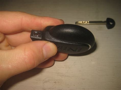 Image result for Changing Battery On a Mini Key