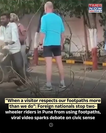 A video from Pune has gone viral showing two foreign nationals stopping two wheeler riders from driving on footpaths at Rakshak Chowk in Pimple Nilakh. The clip sparked a strong online reaction, with many users debating civic sense, traffic discipline and why visitors appeared more concerned about pedestrian safety than local riders. #Viral #TimesNow | TIMES NOW