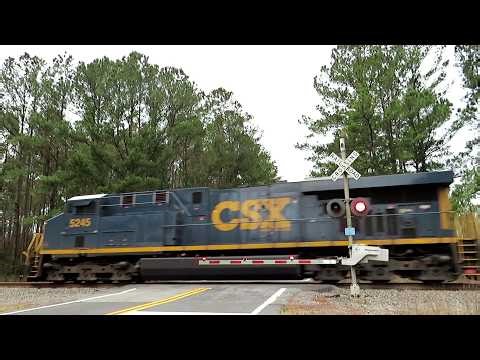 Beating A Fast Freight Train To The Another Crossing