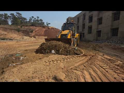 jcb working on a new school construction site.