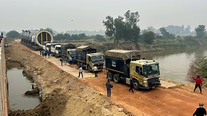 12M views · 231K reactions | 5 trucks together pulled a trailer with 416 tires and crossed Ghaggar river, Amazing truck video #truckvideo #amazingtruck #trucks #machines #machinery | Amazing Box | Facebook