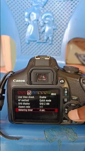 How to set metering timer in canon 1500d camera