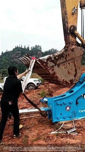 A Woman Guiding Excavator to Install Hydraulic Breaker Chisel