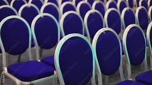 Empty modern conference hall, venue for congress lecture, line row of chairs, auditorium for convention and press conference event, interior of room for presentation with a lot of seats and no people
