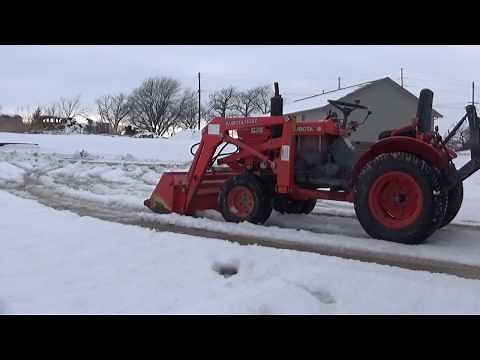 Kubota b7100 plowing snow