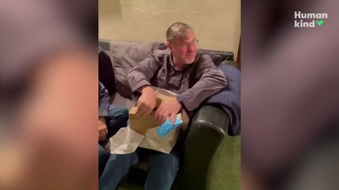 Dad squeals with delight when gifted a rabbit