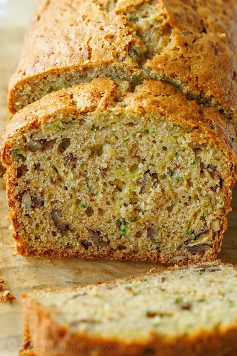 This homemade Zucchini Bread is loaded with zucchini and it’s delicious any time of day. It’s perfectly soft and sweet with a cozy hint of cinnamon RECIPE: https://natashaskitchen.com/zucchini-bread-recipe/ | NatashasKitchen.com