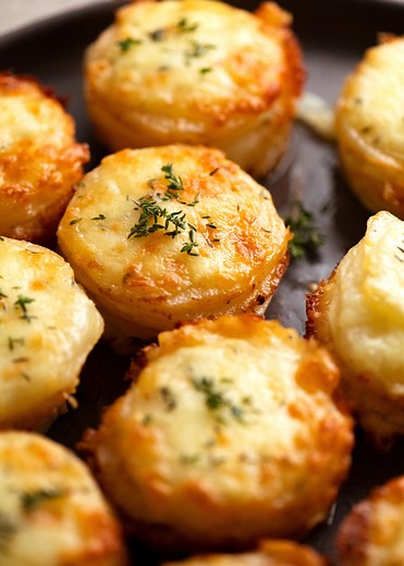 2.1M views · 5.2K reactions | These Mini Potato Gratin Stacks are cheesy, creamy and ridiculously irresistible!!! Get the full recipe: https://www.recipetineats.com/cheesy-potato-gratin-stacks-muffin-tin/#wprm-recipe-container-24183 | RecipeTin | Facebook