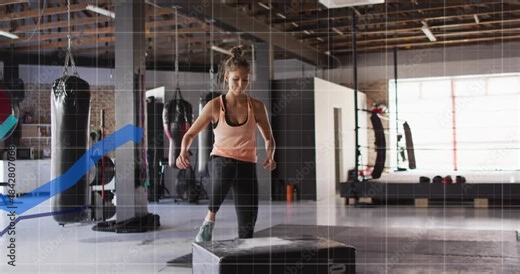 Woman starting on plyo box doing step-ups and jumps in gym, showing teal graphs building power