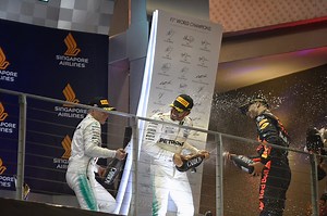 Formula One: Lewis Hamilton wins wet and wild Singapore Grand Prix, increases championship lead to 28 points