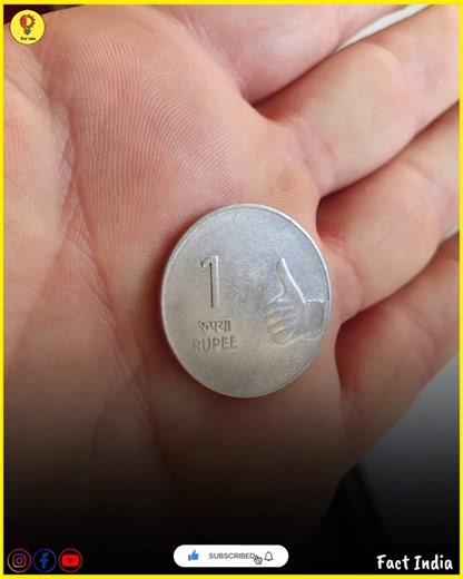 Why is there a thumb impression on the one rupee coin?
