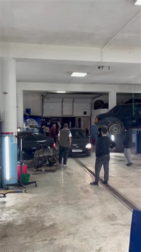 Inside an Automotive Repair Shop: Mechanics at Work