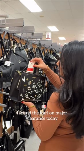 Anju | US Deals and Finds on Instagram: "RUN to TJ Maxx for these designer clearance finds! 🏃‍♀️👜 📍 The Deal: I found a whole section of Karl Lagerfeld bags marked down with red stickers! The Tote: Only $56 (The graffiti art is so cool!) The Crossbody: Down to $40 The quality feels amazing and the logo straps give it that expensive look. These are perfect everyday bags if you want to look boujee on a budget. ✨ Would you rock the graffiti style or is it too busy? 👇 #tjmaxxfinds #karllagerfeld