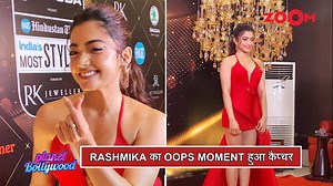 Rashmika Mandanna looked stunning in a red thigh-high slit dress with a plunging neckline at an award show. The actress looked uncomfortable as she posed with the paps. Watch the full video to know more. #ZoomTV #RashmikaMandanna #Actress #SouthActress #Bollywodo #Pushpa | Zoom TV