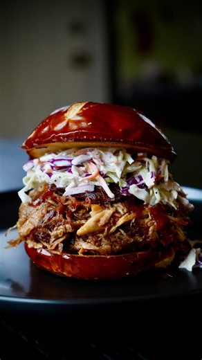 Cal Reynolds on Instagram: "Smoked Pulled Pork 🐷💨🔥 Pulled Pork is one of my favorite easy delicious ways to feed a crowd during the holidays! This cooking method is fool proof and delivers tender, juicy amazing results every time! FULL RECIPE ⬇️ INGREDIENTS - 10-12 lb Bone-In Pork Shoulder Butt - Yellow Mustard - BBQ Rub of choice - 5-6 tbsp butter (cut into pats) - 2-3 tbsp brown sugar - 2-3 tbsp honey - Pretzel Buns Coleslaw: (Combine all ingredients then place in the fridge until ready to 